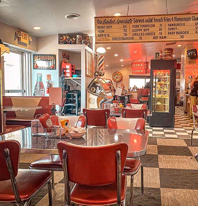 Red vinyl booths and vintage memorabilia create the perfect backdrop for a meal that tastes as good as it photographs.