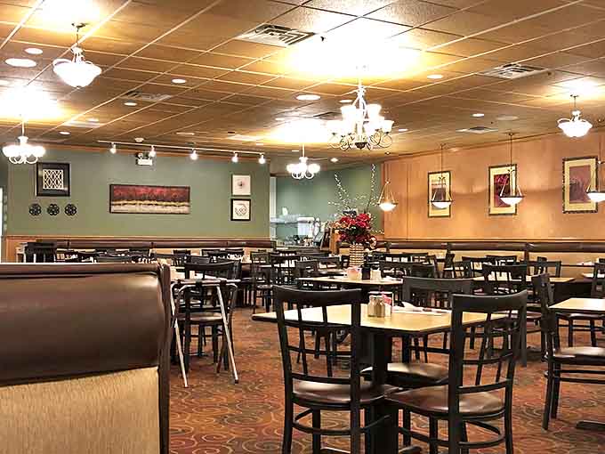 A dining room that says "stay awhile" with lighting warm enough to make everyone look good in their pre-coffee state.