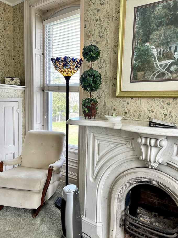 Marble fireplaces stand as functional art pieces, ready to warm both the room and the spirits of winter visitors.