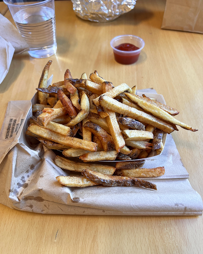 These aren't just any fries – they're the perfect golden companions to Buddy's famous shakes, hand-cut daily for maximum crispy satisfaction.