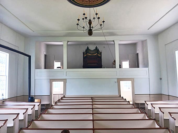 The simple elegance of this historic church interior proves that spiritual contemplation doesn't require stadium seating or sophisticated sound systems.