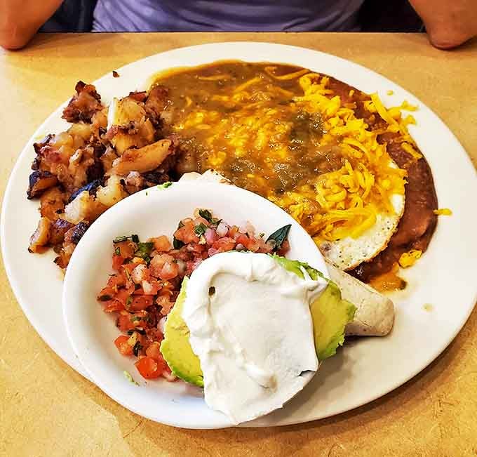 A Mexican breakfast fiesta on a plate &ndash; eggs, cheese, and salsa creating a south-of-the-border symphony that wakes up your taste buds.