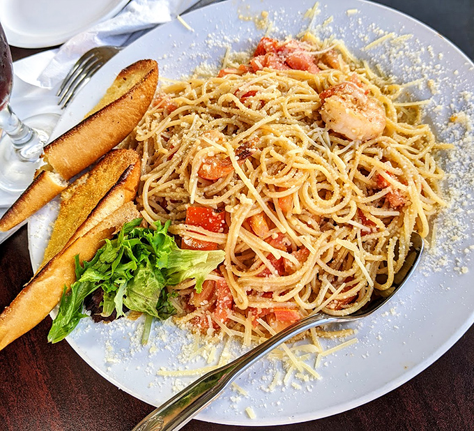 Twirls of pasta dancing with shrimp in a sauce so good you'll be tempted to drink it straight.