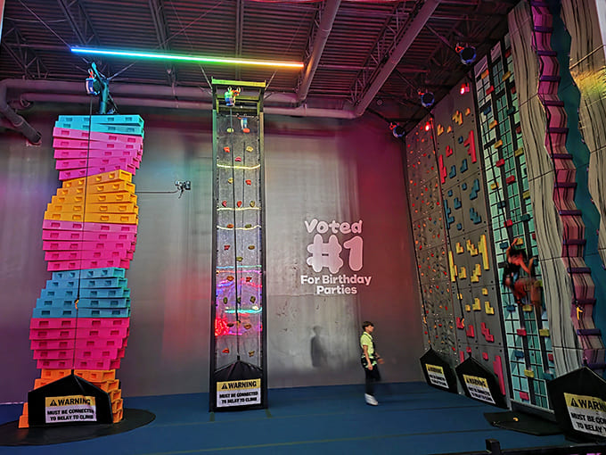 The technicolor climbing walls transform vertical challenges into art, with each handhold offering a new puzzle to solve.