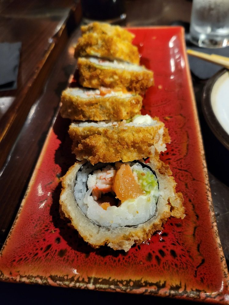 Crispy tempura coating gives way to velvety salmon and avocado – like wearing a crunchy jacket over silky pajamas for your mouth.