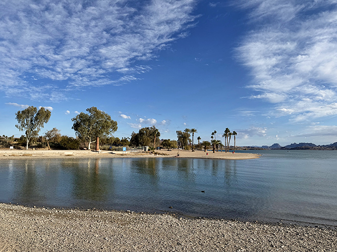 Tranquil morning reflections create mirror images on Lake Havasu, nature's own Instagram filter at work.