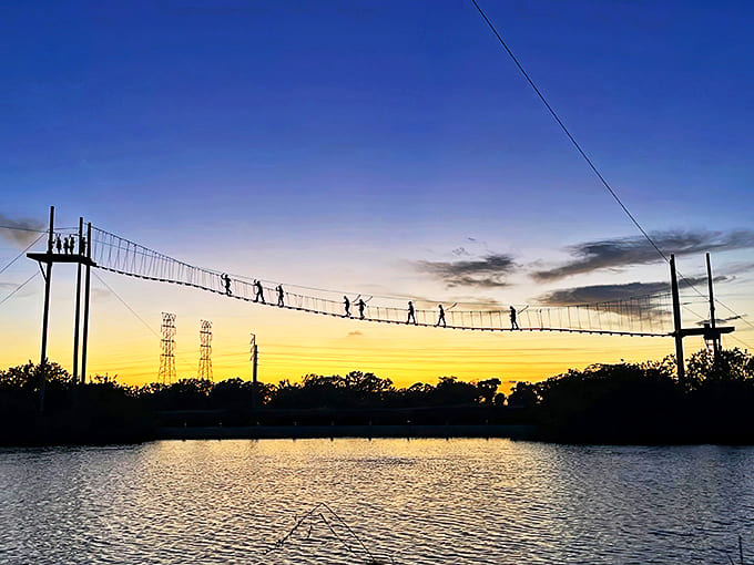 Silhouetted against cloudy skies, the telephone monument takes on an almost mystical quality, like a communications totem from another dimension.