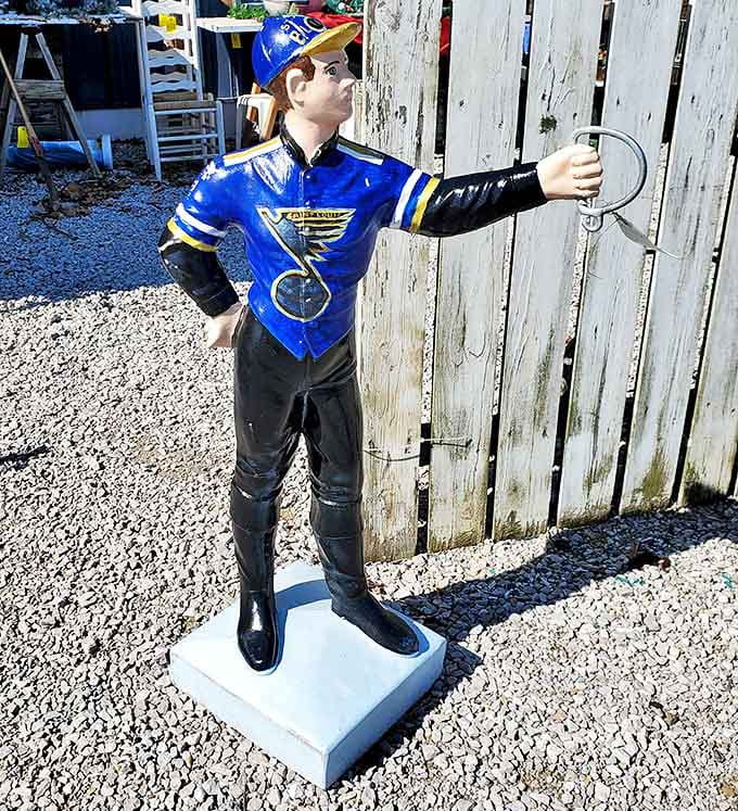 This vintage St. Louis Blues hockey player stands guard outside, a quirky sentinel welcoming sports memorabilia collectors.