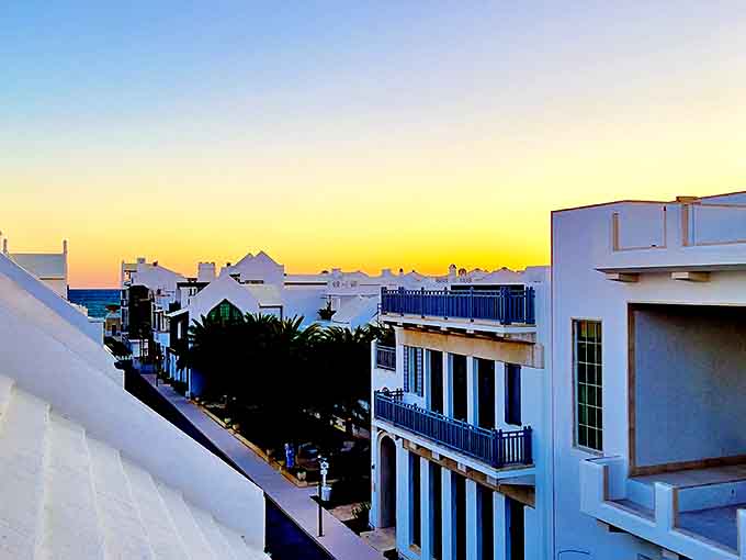 Sunset: When day bids farewell over Alys Beach, the white buildings glow with amber light, creating a magical twilight kingdom worthy of fairy tales.