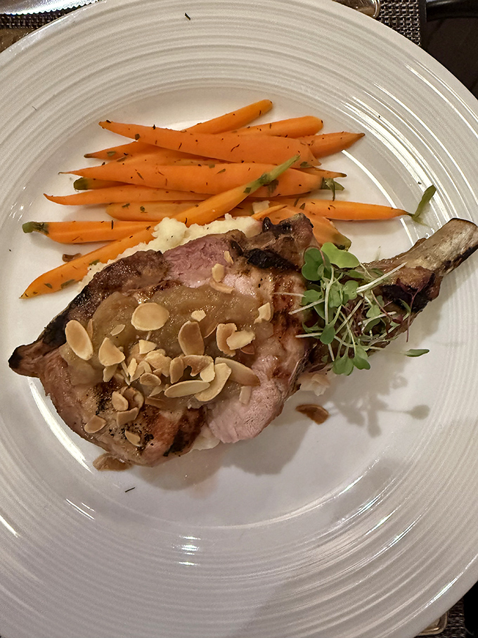 The tomahawk steak arrives like a culinary exclamation point – impressive, dramatic, and worth every moment of anticipation.