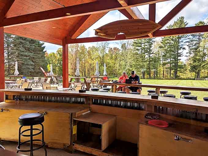 The covered outdoor bar area offers the best of both worlds &ndash; protection from the elements while still allowing guests to enjoy Michigan's beautiful seasonal weather.
