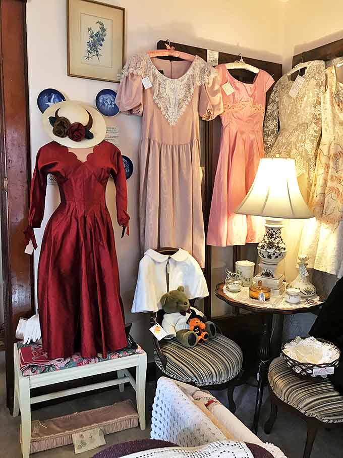 These vintage wedding gowns hang like ghosts of happy days, their delicate fabrics and intricate details preserved for new generations.