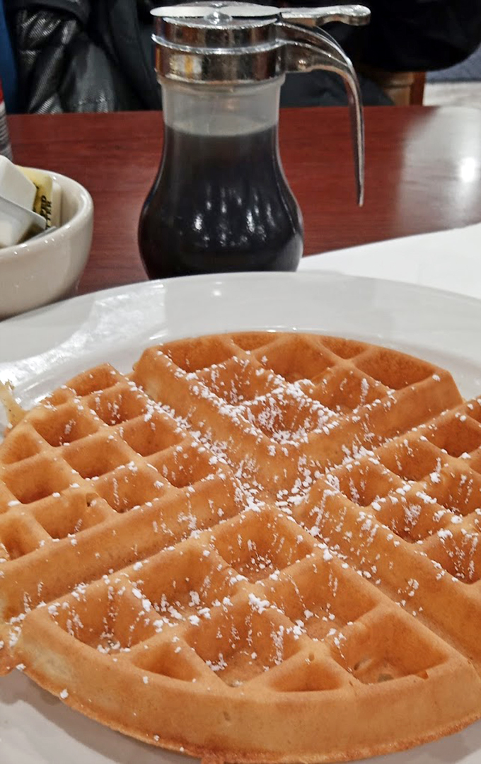 Waffle, waffle on the wall, who's the crispiest of them all? This golden beauty is ready for its syrupy crown! 