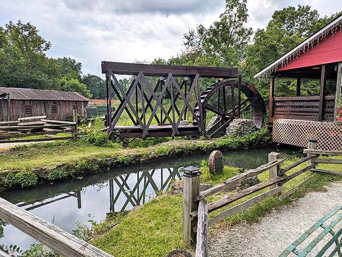 The water wheel turns hypnotically, a mechanical dinosaur from another era that somehow survived into our digital age.