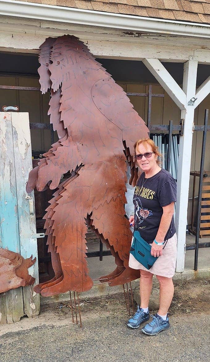 This impressive metal Bigfoot silhouette stands tall outside the market &ndash; the perfect yard art for someone with a sense of humor and adventure.