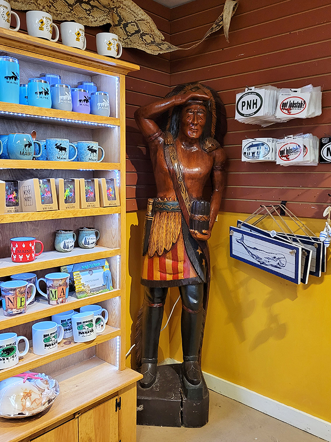 This wooden Native American statue stands watch over shelves of Maine-themed merchandise, adding character to an already character-filled establishment.