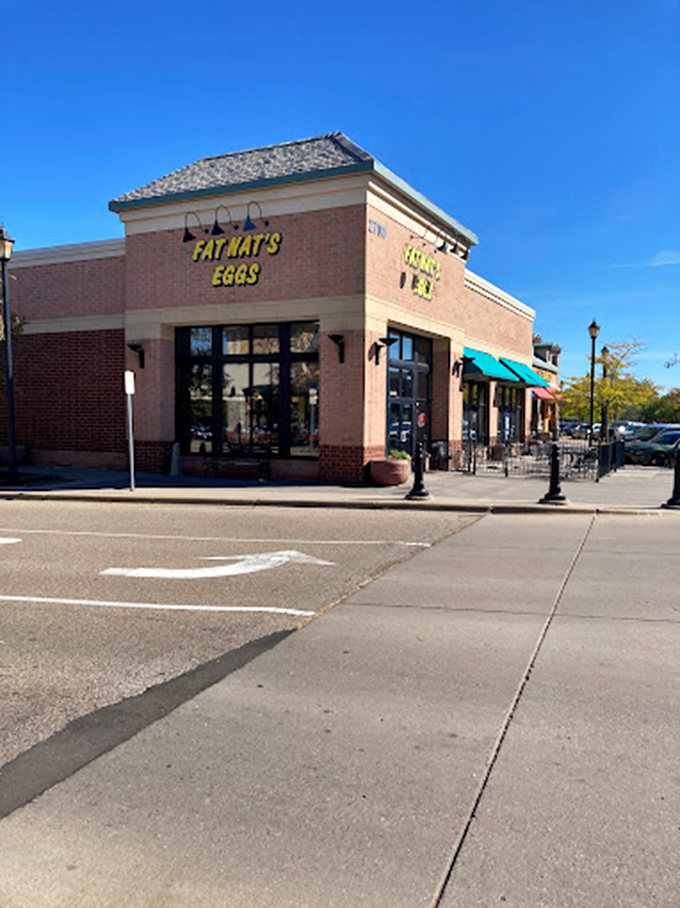 Where breakfast dreams come true. The cheerful exterior promises pancakes that will put a spring in your step (if you can still walk).