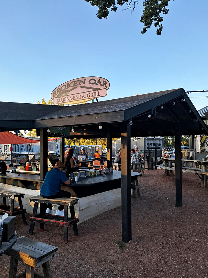 Welcome to Broken Oar, where the only thing broken is your diet! This alfresco dining area is the perfect spot to soak up sun and suds.