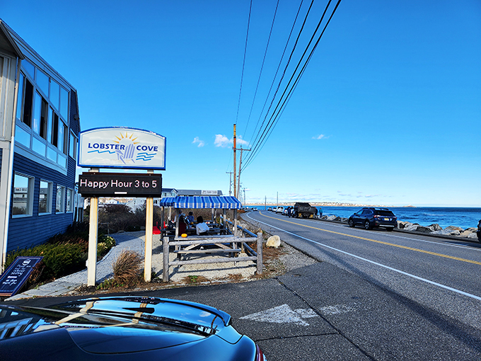 Welcome to seafood paradise! Lobster Cove's blue-and-white facade is like a siren's call to hungry travelers and locals alike.