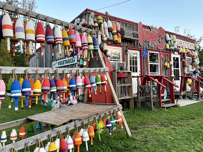 A rainbow explosion of buoys! This lobster shack's exterior is like a maritime Mardi Gras, proving seafood can be serious fun.
