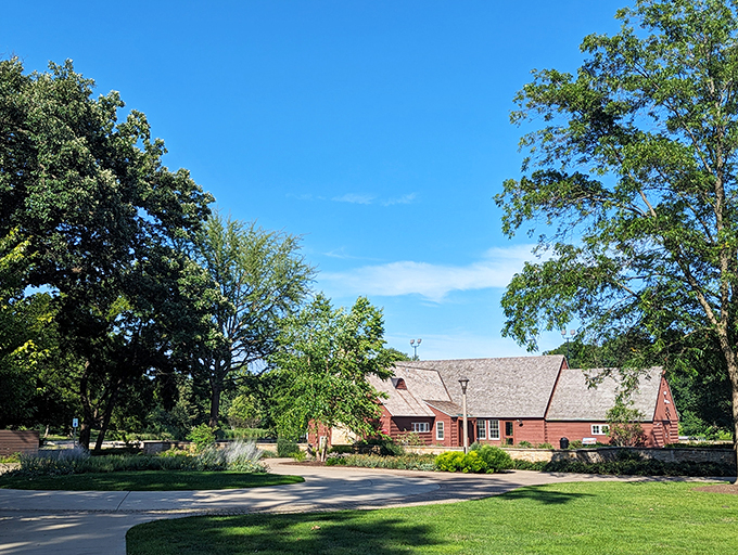 A rustic red beauty nestled in nature's embrace. The Lake Ellyn Boathouse looks like it's straight out of a Norman Rockwell painting, inviting you to slow down and savor the moment.