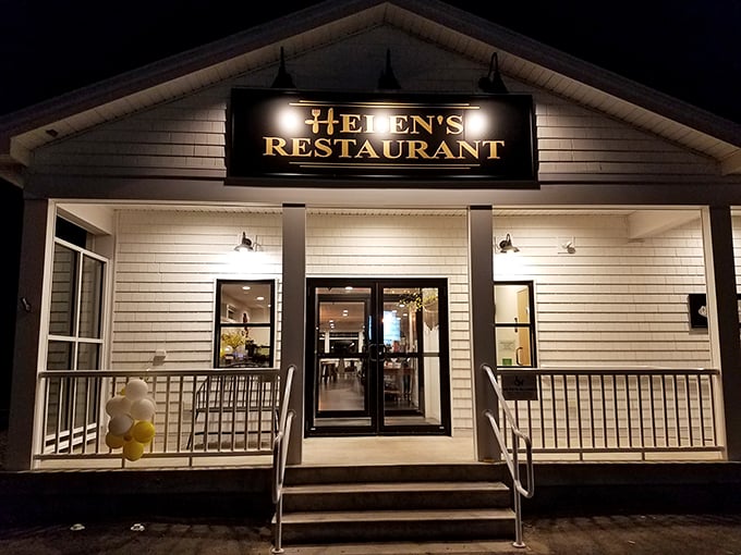 A beacon of culinary delight! Helen's Restaurant glows invitingly against the night sky, promising a feast for both the eyes and the taste buds.