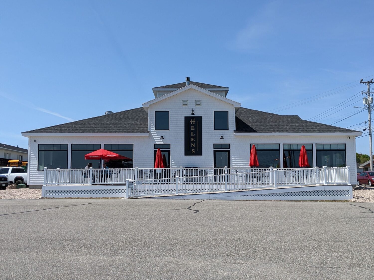 A beacon of culinary delight! Helen's Restaurant glows invitingly, promising a feast for both the eyes and the taste buds.