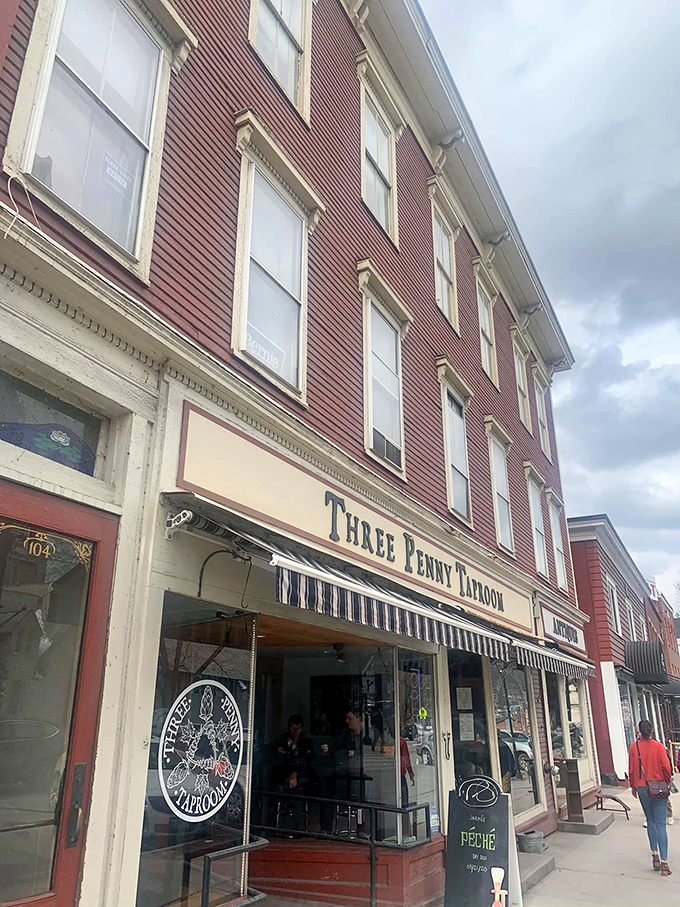 Welcome to Three Penny Taproom, where the beer flows as freely as the local gossip. This unassuming facade hides a treasure trove of hops and happiness.