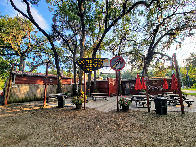 Welcome to BBQ paradise! This little red shack with its pink pig guardian is where smoky dreams come true.