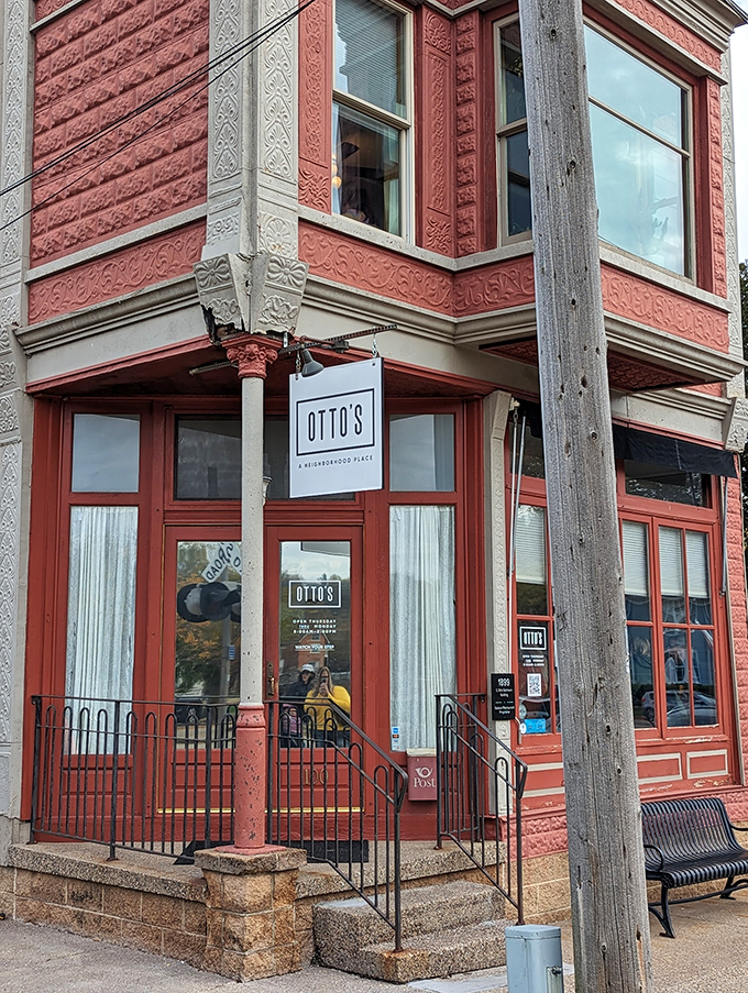 Step into a time machine disguised as a salmon-colored Victorian dream. Otto's Place isn't just a restaurant; it's a portal to delicious nostalgia.