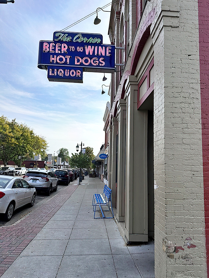 "Hot dogs and liquor? It's like they read my diary!" The Corner Bar's neon sign promises a feast for both stomach and spirit.