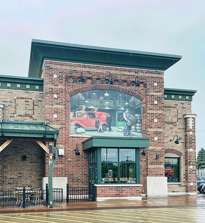 Step into a time machine disguised as a restaurant! Portillo's brick exterior and vintage mural transport you to the Roaring Twenties, minus the bootlegging (we hope).
