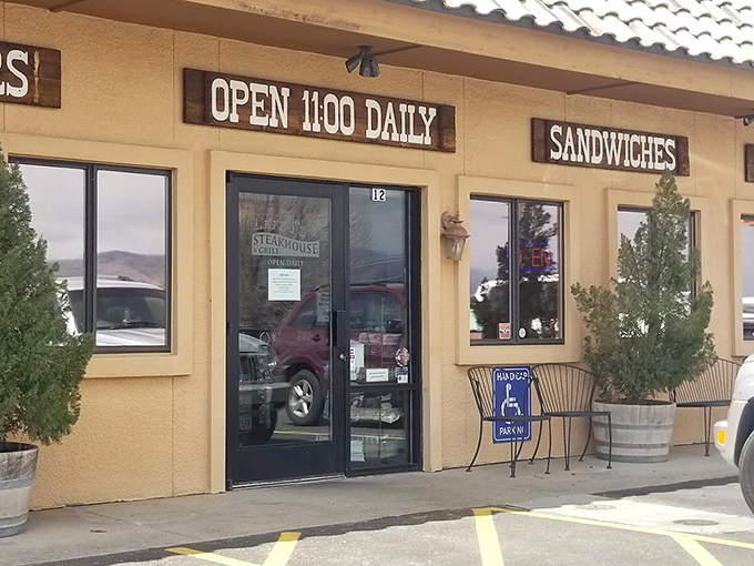 Welcome to steak paradise! Leff-T's Steakhouse & Grill stands proud, its sign a beacon for carnivores and comfort-seekers alike. 