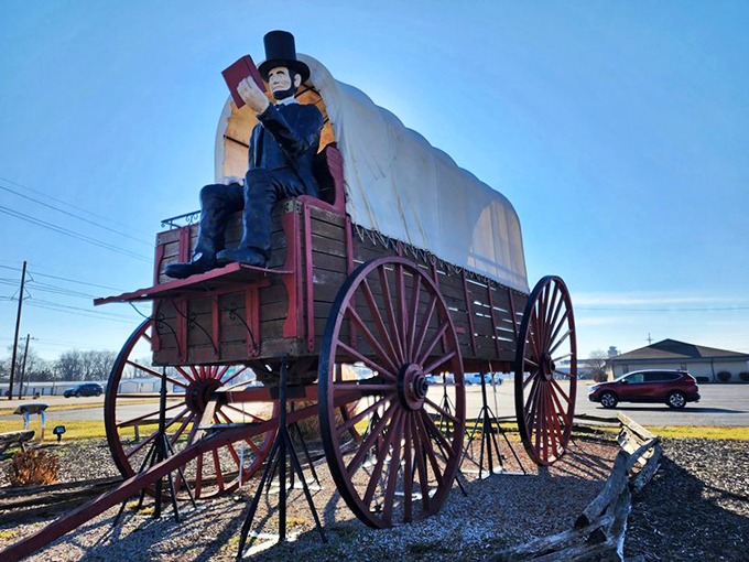 "Honey, I supersized the wagon!" This colossal covered wagon would make even Paul Bunyan do a double-take. Abe's along for the ride, proving everything's bigger in&hellip; Illinois?
