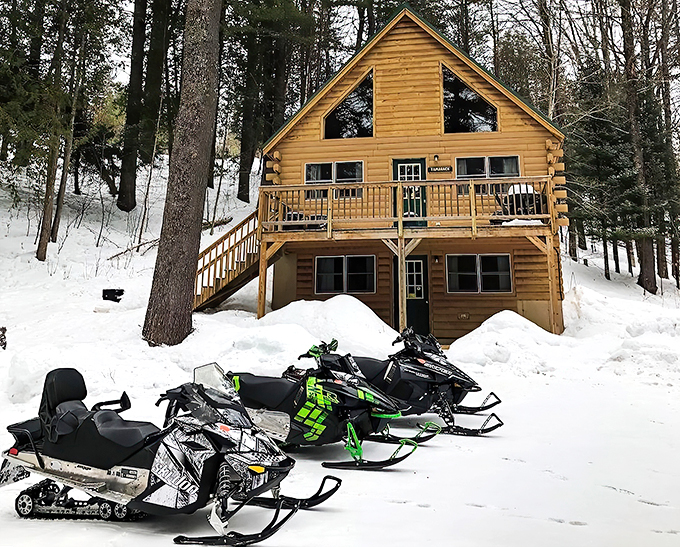 Snowmobile paradise! This cozy cabin beckons winter warriors with the promise of frosty adventures and toasty evenings by the fire.