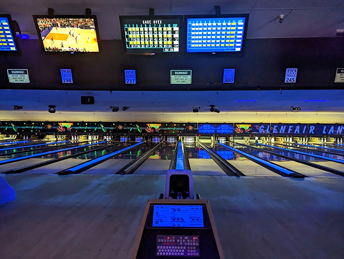 The cosmic bowling experience transforms ordinary lanes into a neon wonderland, where even gutter balls look spectacular under the electric glow.