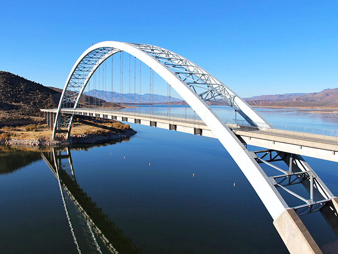 A bridge to paradise? No, just Arizona! This architectural marvel spans Roosevelt Lake, inviting adventure seekers to cross into a world of aquatic wonder. Photo credit: ABC Bicycle & Jet Ski Rental