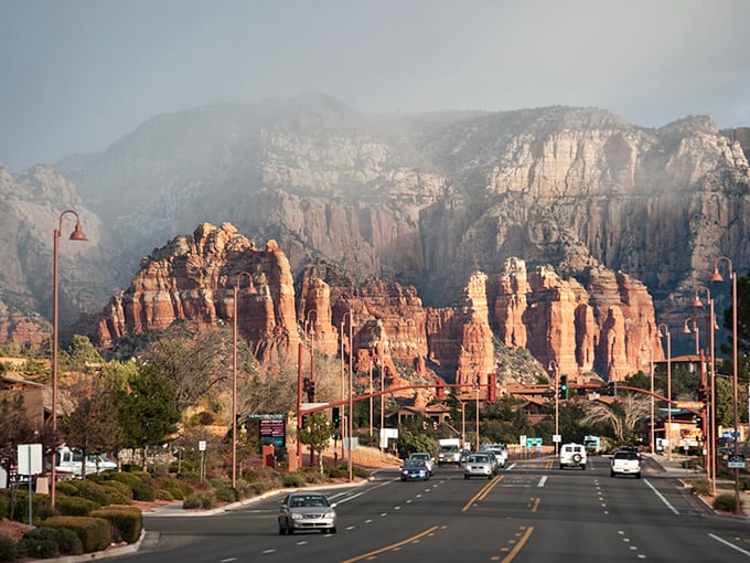 Where desert meets destiny: A winding ribbon of asphalt cuts through Arizona's rugged landscape, promising adventures ahead.
