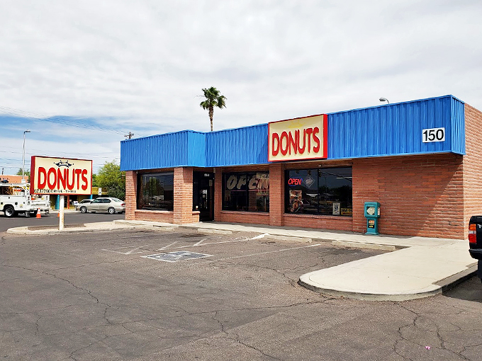 A classic slice of Americana in Tucson - this no-frills donut shop with its bright blue awning promises sweet satisfaction.