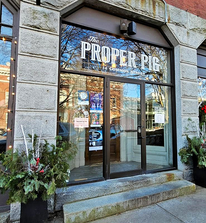 A welcoming storefront that promises proper porcine pleasures, complete with twinkling lights and festive greenery. Classic Maine charm meets modern gastropub.