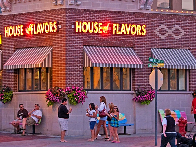 Step into a time machine disguised as a diner! House of Flavors' neon sign beckons like a beacon of nostalgia, promising comfort food and a hefty side of yesteryear.