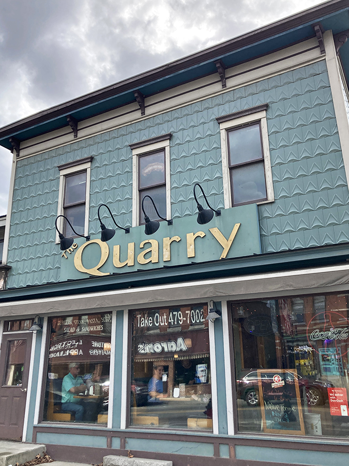 Welcome to flavor town! The Quarry's teal facade is like a beacon for hungry souls in Barre.