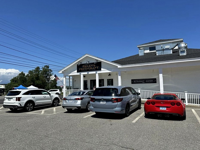 A classic white New England restaurant that promises comfort and charm, Helen's stands proudly against Maine's blue skies.