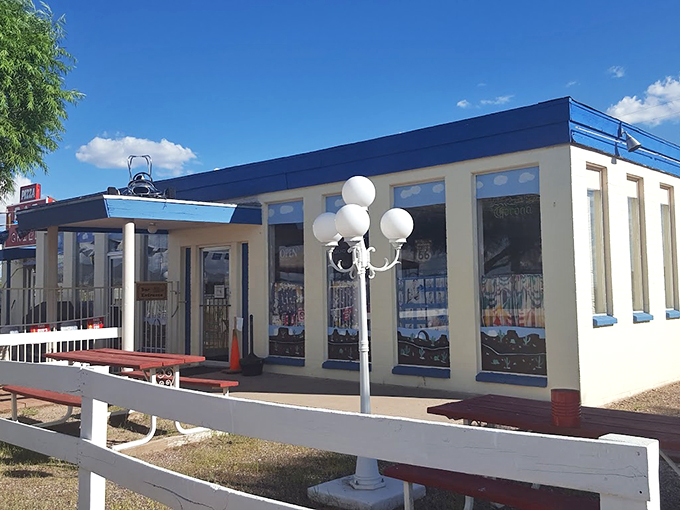 A slice of Americana along Route 66, this charming white-and-blue building with its classic picnic tables promises comfort food and nostalgia.