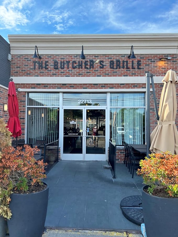 The Butcher's Grille welcomes you with classic brick charm and modern flair, like a steakhouse that got a millennial makeover.