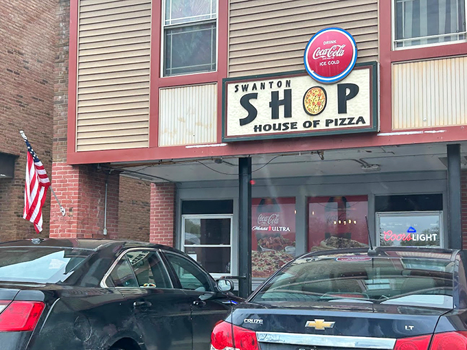 Welcome to flavor town! Swanton House of Pizza's unassuming exterior hides a world of culinary delights waiting to be discovered.