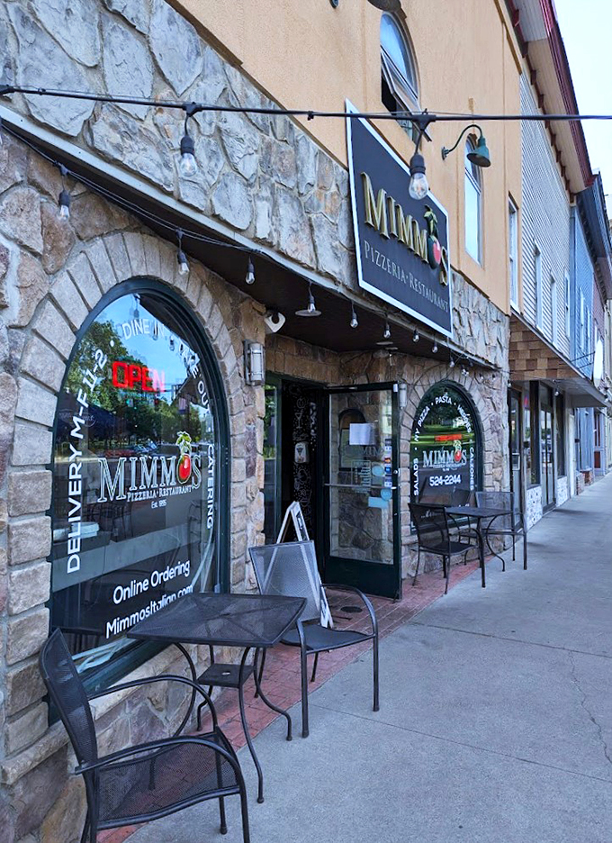 A stone facade that whispers "Come in, we've got pizza!" Mimmo's exterior is like a warm Italian hug waiting to happen.