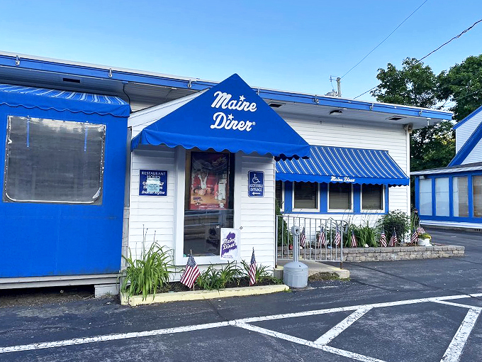 The iconic blue awning and American flags welcome you like an old friend &ndash; this isn't just a diner, it's a slice of Maine hospitality.