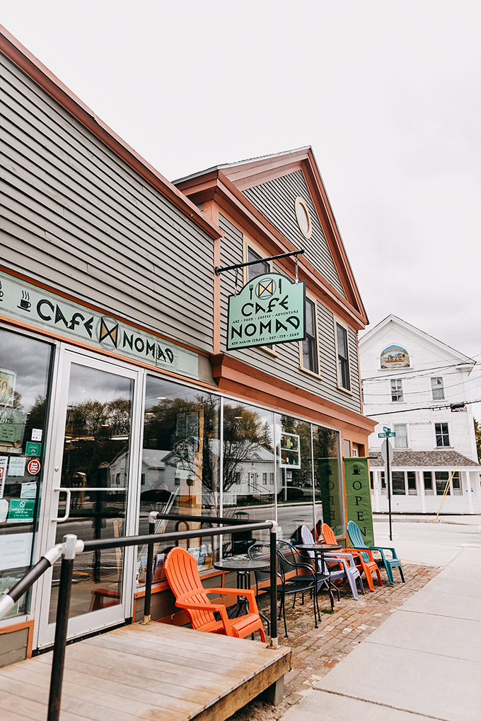 A charming slice of small-town Maine, where colorful Adirondack chairs invite you to slow down and savor your morning coffee.