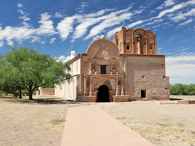 Holy guacamole, Batman! This mission's got more curves than a telenovela star. Tumacacori's facade is like a time-traveling selfie backdrop.